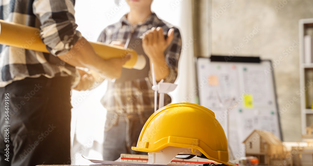 Engineer teams meeting working together wear worker helmets hardhat on ...