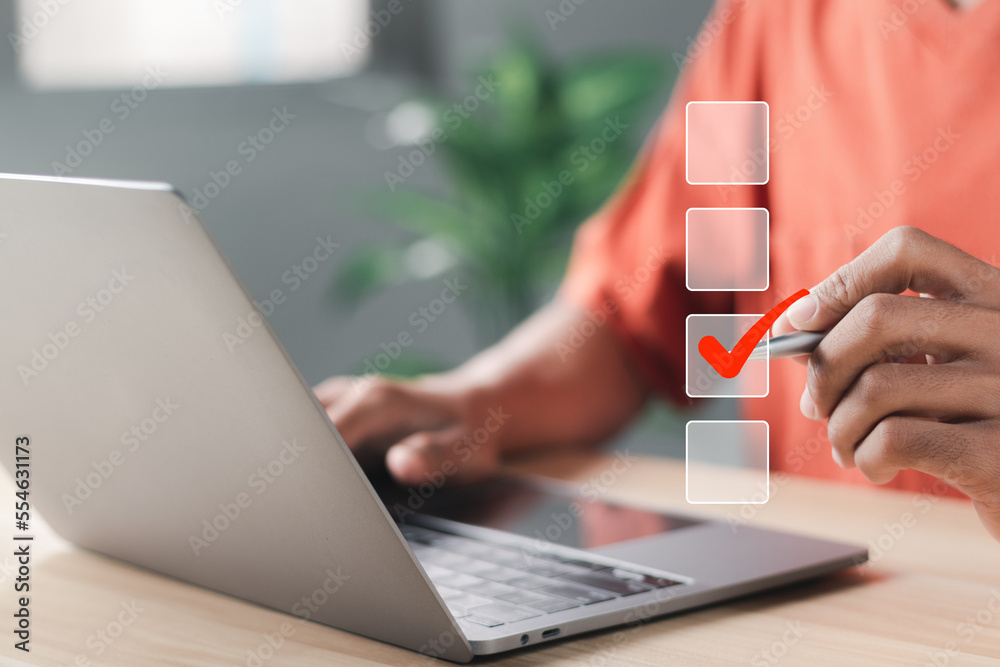 Checklist concept. Businessman checking mark on checkboxes, copy space ...