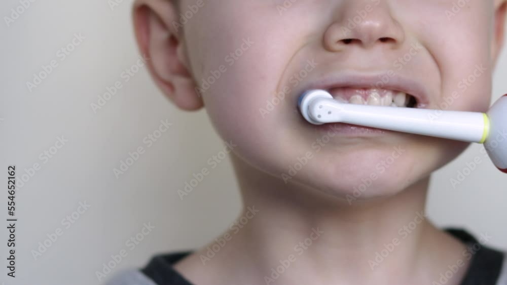 Video Stock unrecognizable kid little boy child brushing milk teeth ...