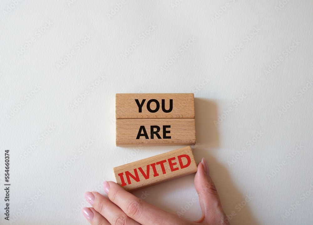You are invited symbol. Wooden blocks with words You are invited ...