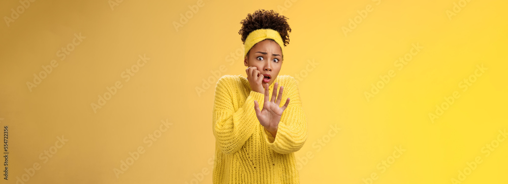 Terrified female victim scared abuse look afraid frightened extend arm ...