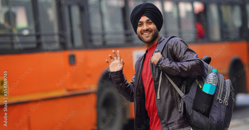 Young Sikh man carrying a bag and going college Stock Photo | Adobe Stock