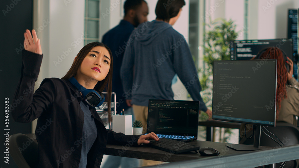 Asian Coder Turning Head To Work With Holographic Server Code Typing Html Script On Terminal