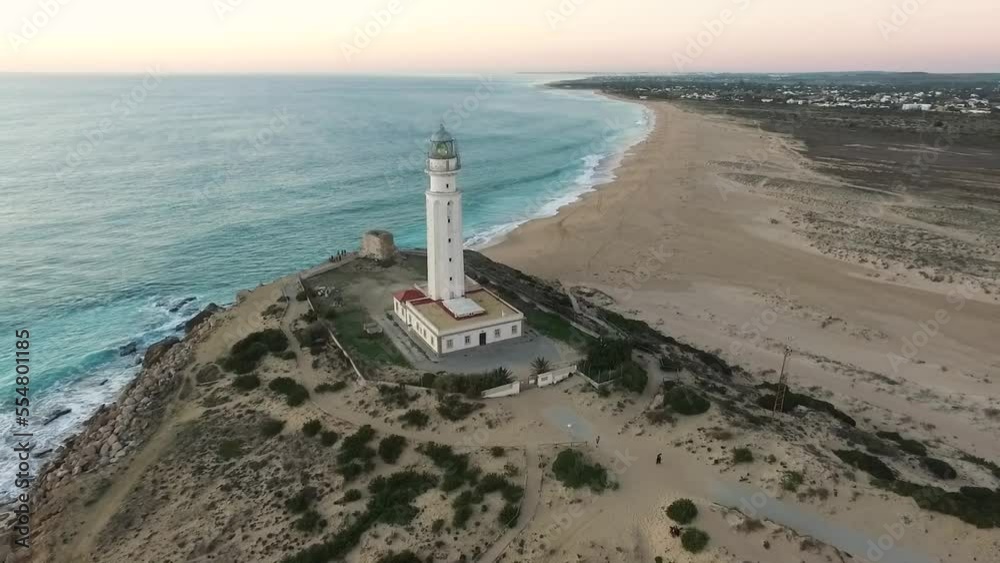 Reveal Drone shot of Trafalgar Lighthouse on the Costa de la Luz in ...