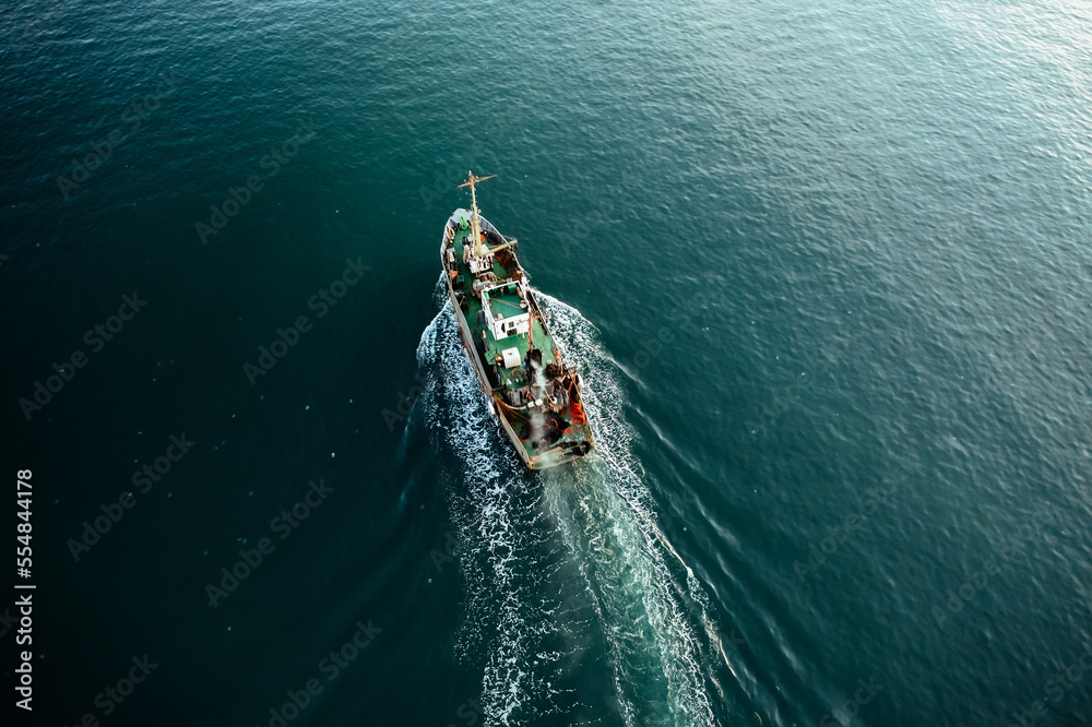 Fishing boat catching fish aerial top view from drone. Small fishing ...