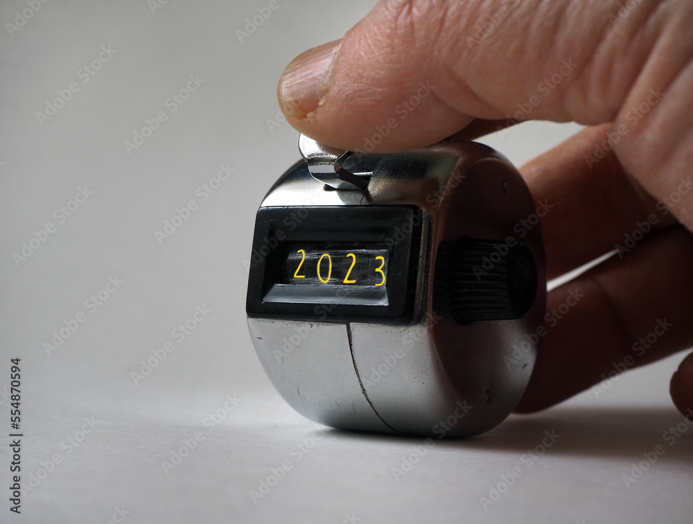 Manual counter with 2023 on its screen. Handheld counting machine ...