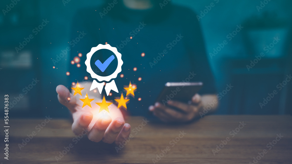 Businessman Hand shows the sign of the top service Quality assurance ...