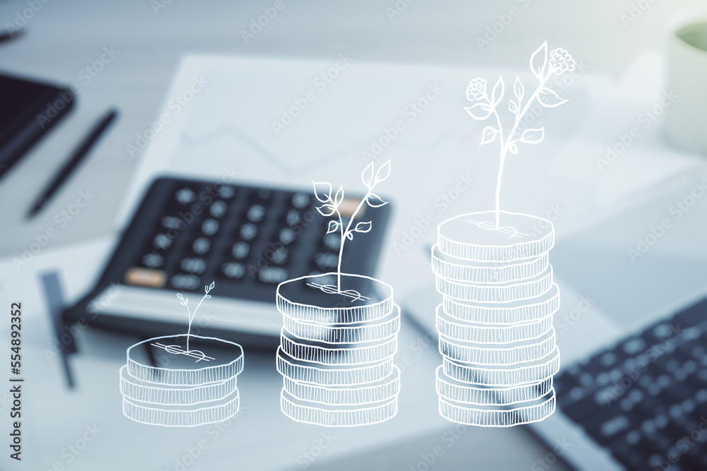 Virtual cash savings sketch on blurry calculator and computer ...