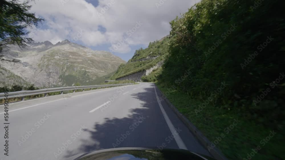Driving from the Grimsel to the Furka pass through the famous valley in ...
