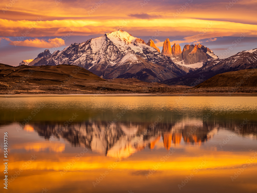 Lenticular clouds and reflection at sunrise in Lago Azul, Torres del ...