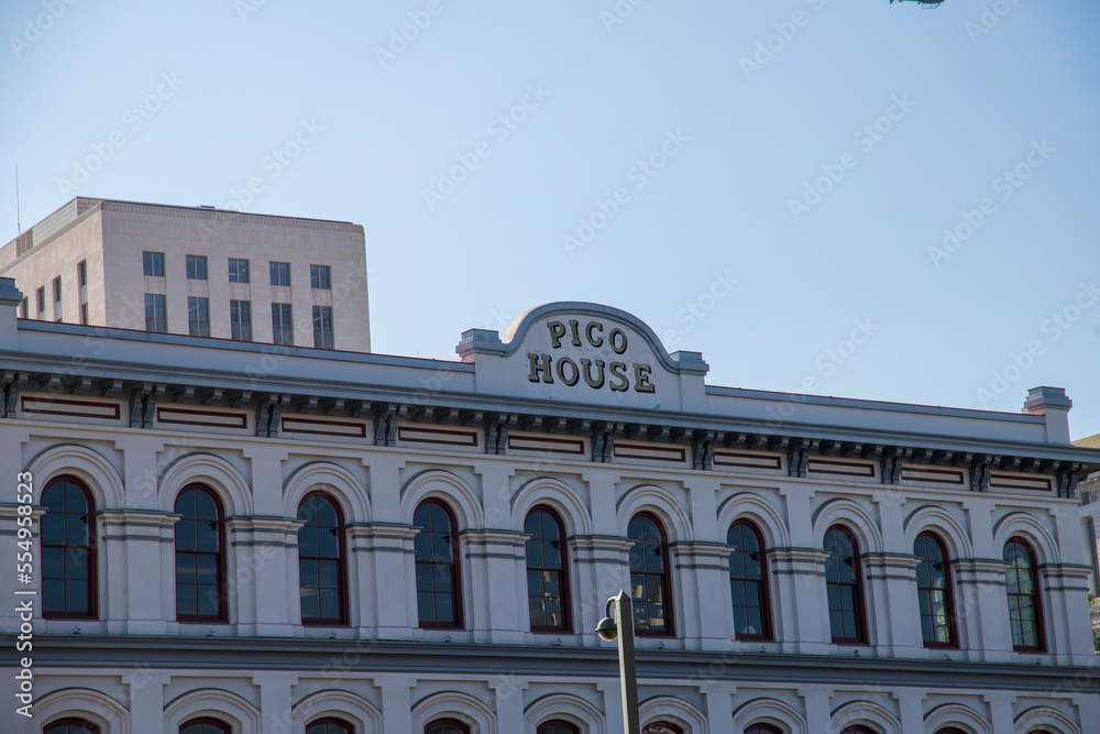 the top of a building labeled Pico House surrounded by other buildings ...