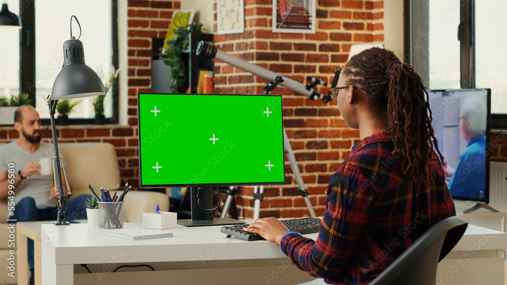Office worker analyzing isolated greenscreen template on personal ...