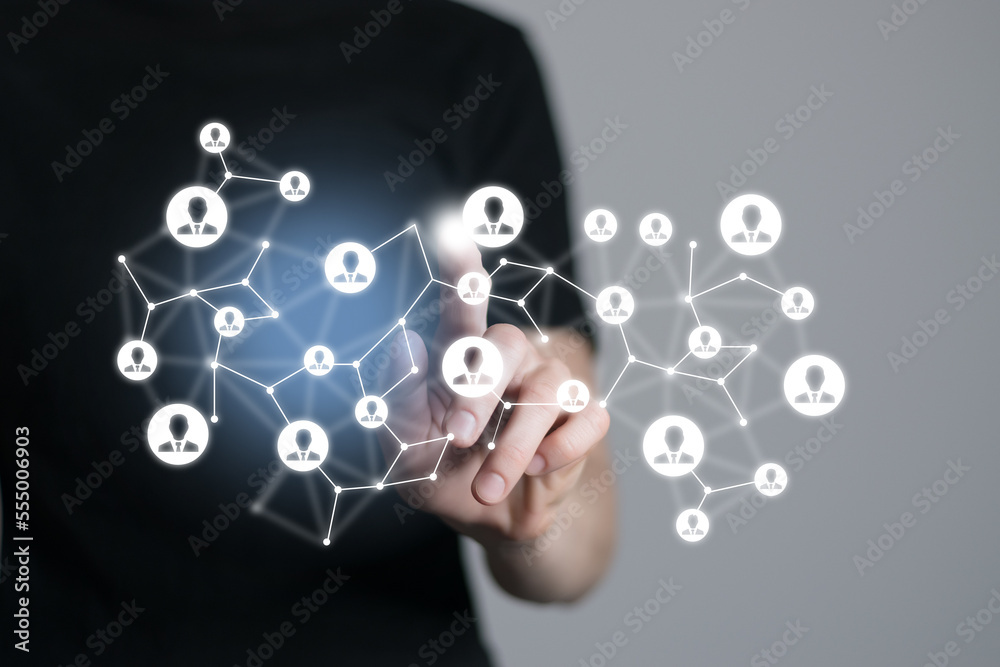 Human resources manager pointing at virtual network chain with person ...