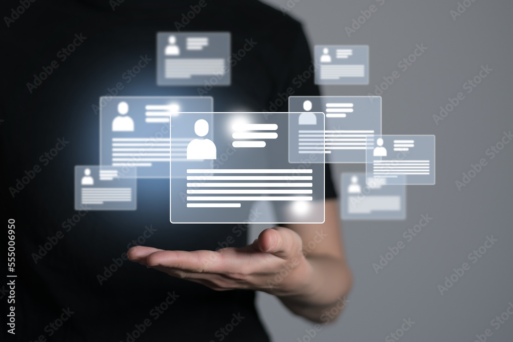 Woman`s hand pointing on highlighted cv cards with candidates ...