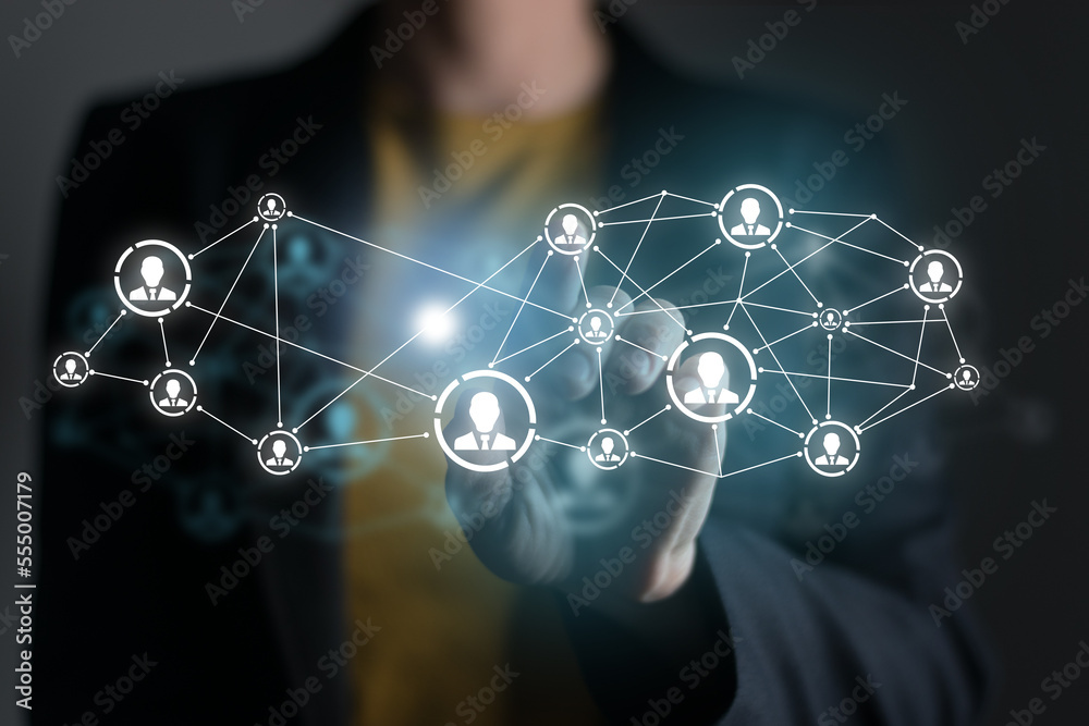 Human resources manager pointing at virtual network chain with person ...