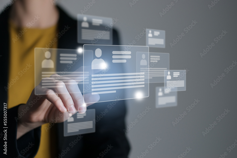 Manager choosing one of many different cv resume cards with candidates ...