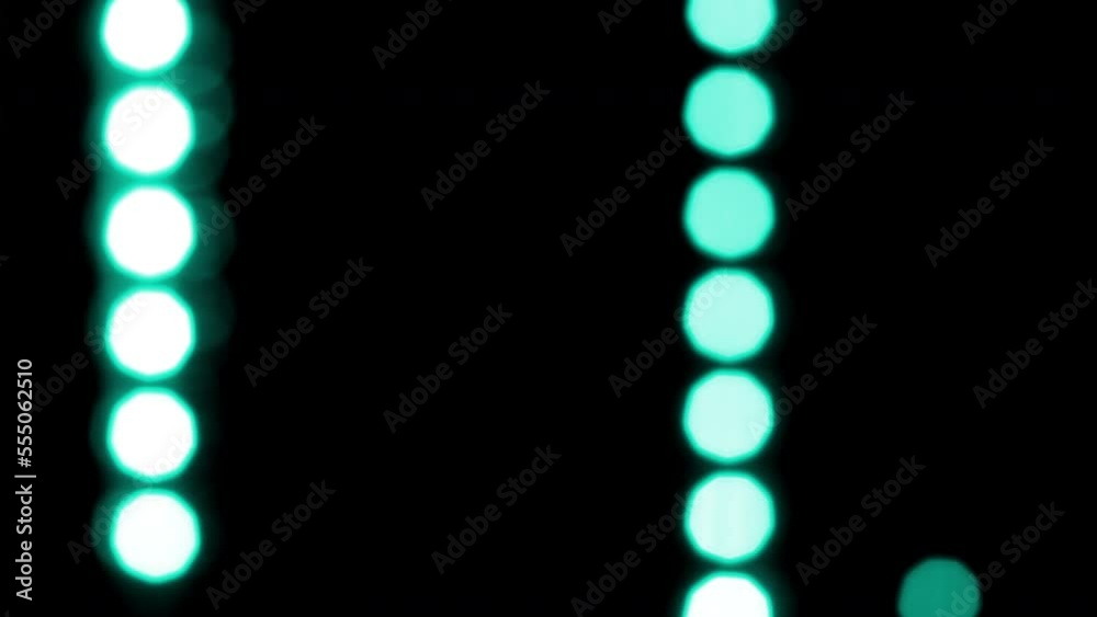 Round turquoise bokeh lines move vertically. Abstract moving background ...