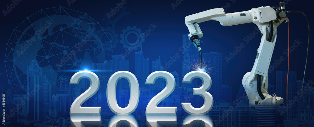 Robot hand pointing on year 2023 showing artificial intelligence ...