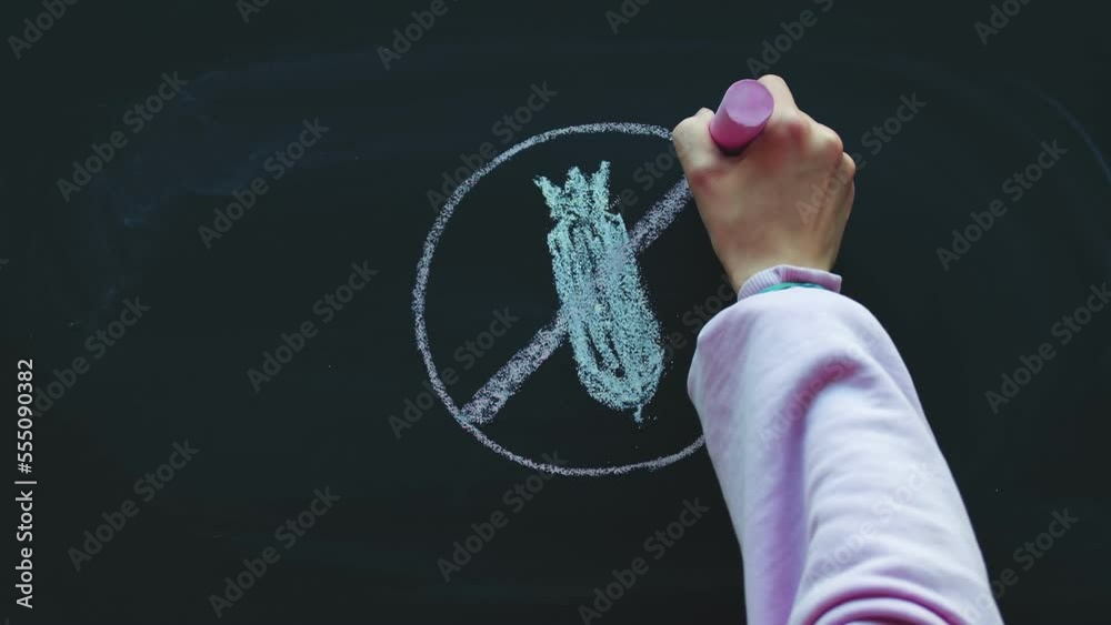 Anti-war protest. Timelapse, a close-up of a child's hand drawing a ...