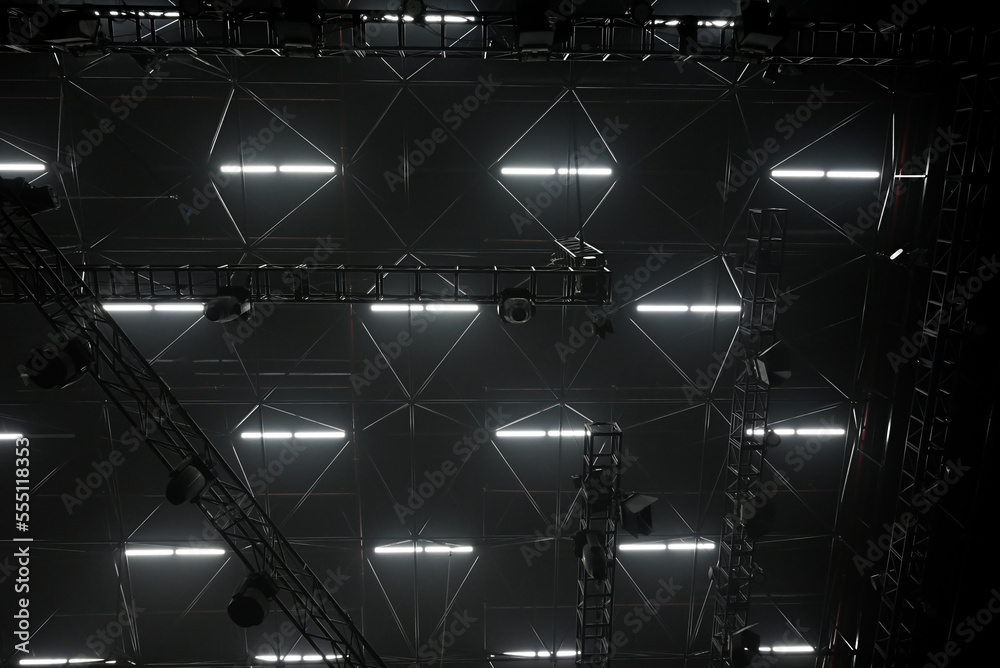 Dark background, ceiling light equipment, light black trusses. Stock ...