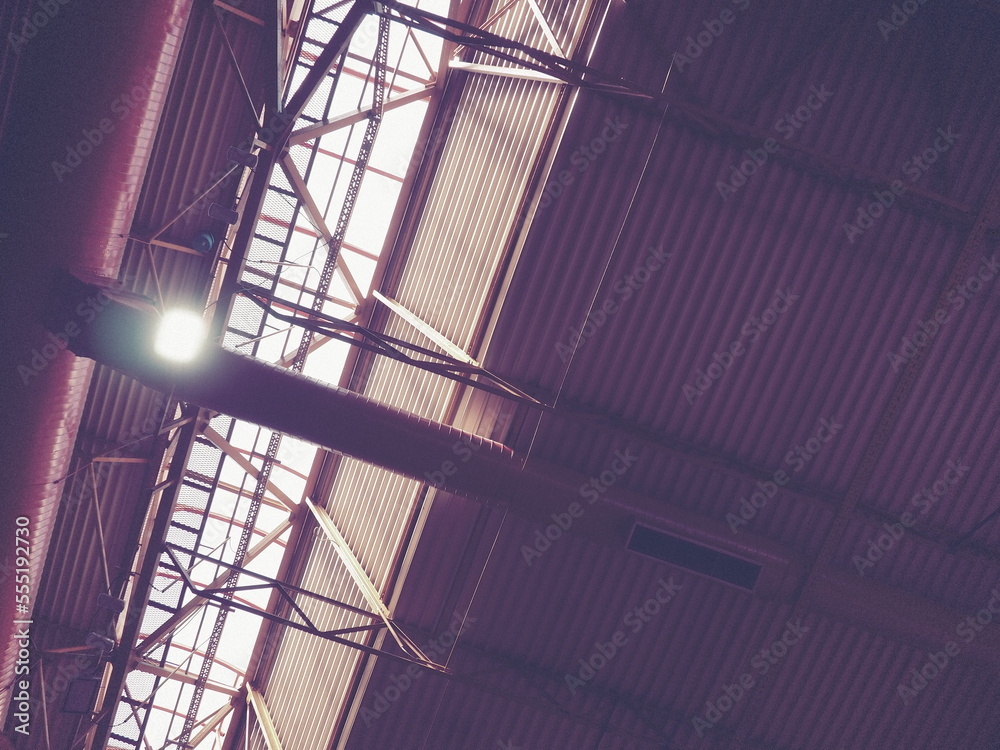 The roof of a hangar, a production hall or a sports hall. Metal ...