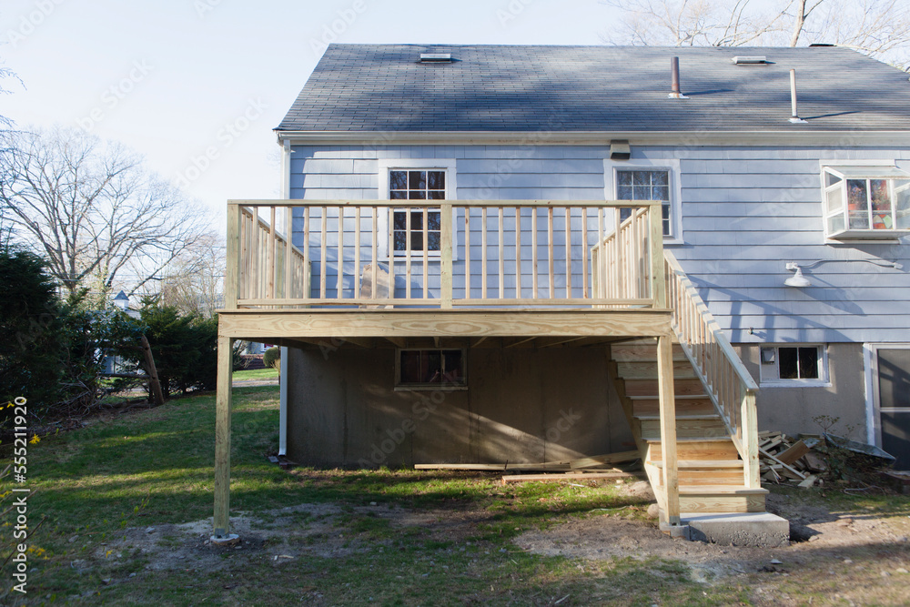 Completed new deck construction on side of private home Stock Photo ...