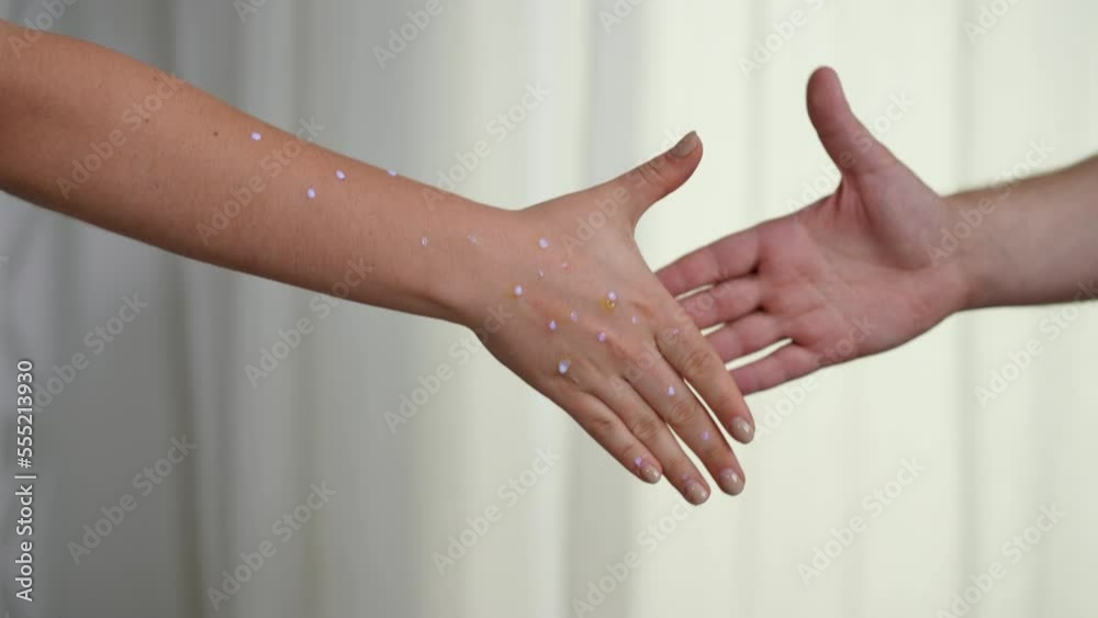 Hands stretching for handshake in slow motion with male palm refusing ...