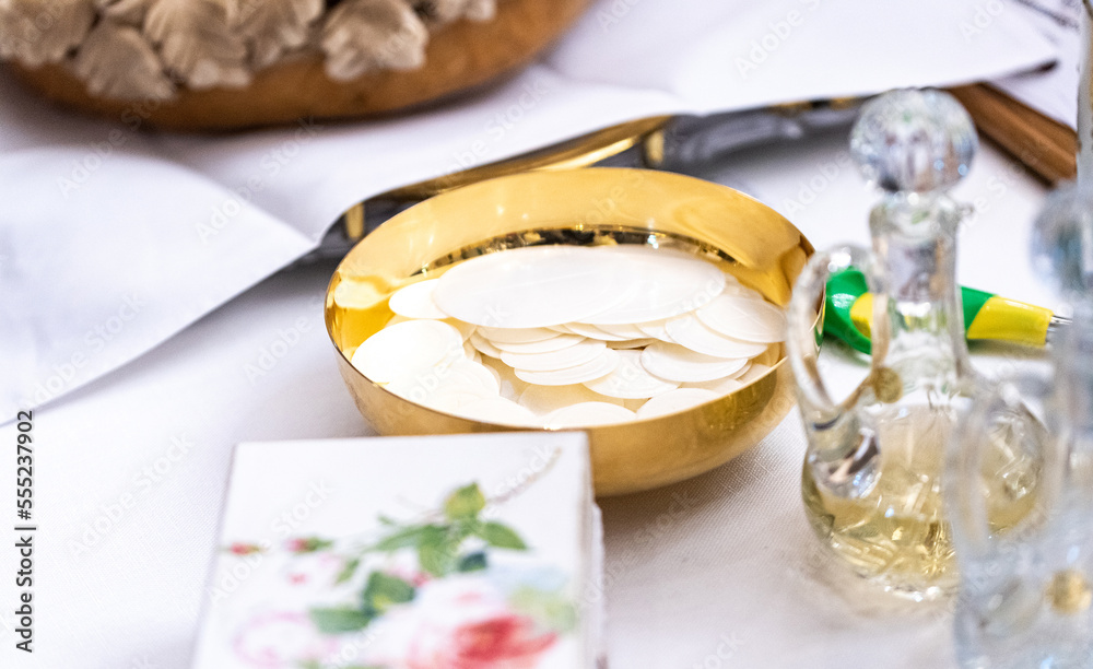 Golden eucharistic vessel with communicants. Holy Communion in the ...