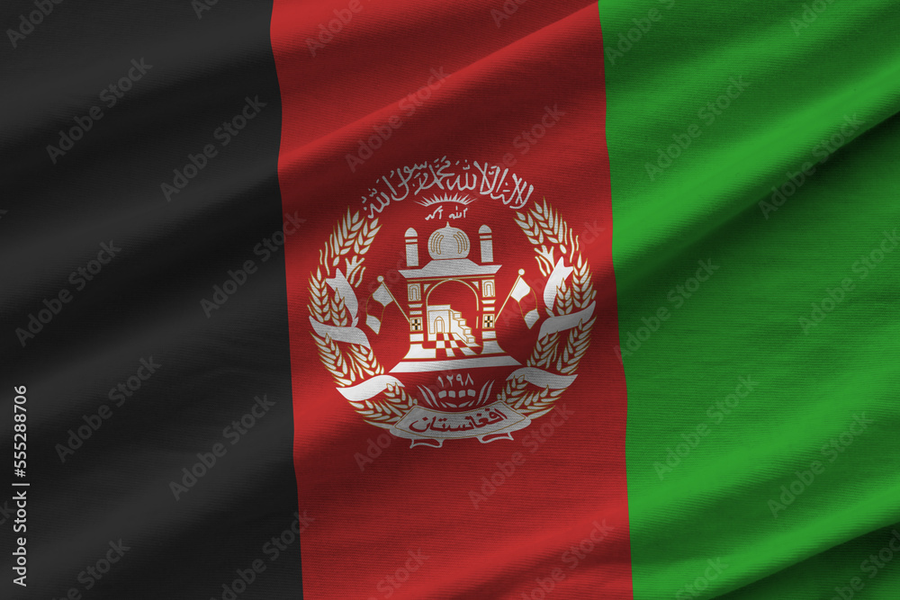 Afghanistan flag with big folds waving close up under the studio light ...
