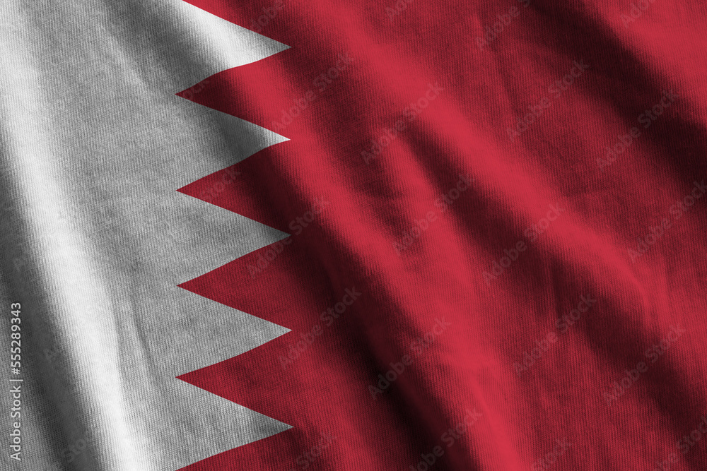 Bahrain flag with big folds waving close up under the studio light ...