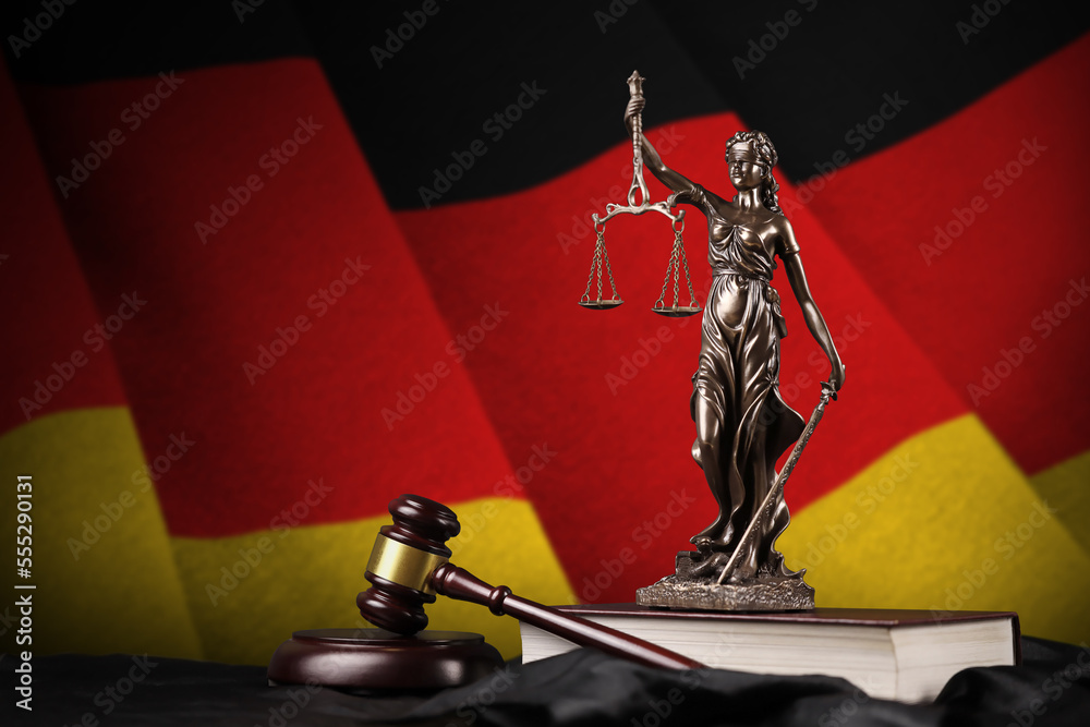 Germany flag with statue of lady justice, constitution and judge hammer ...