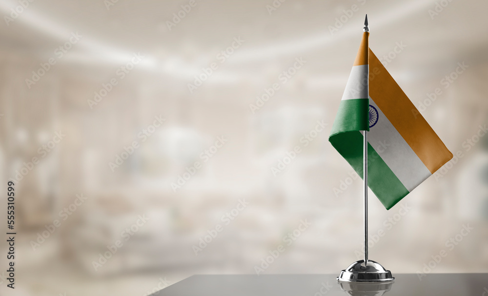 A small India flag on an abstract blurry background Stock Photo | Adobe ...