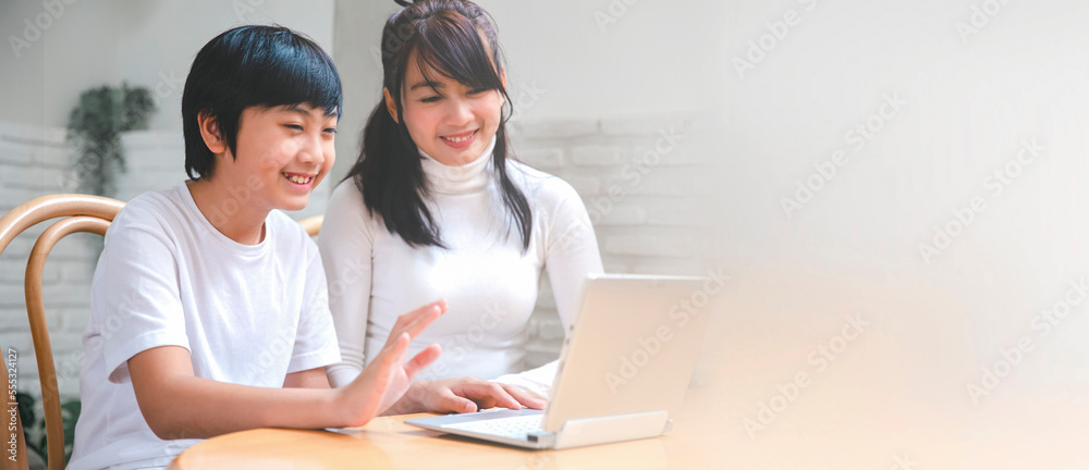 Asian boy student online learning class study online video call at home ...