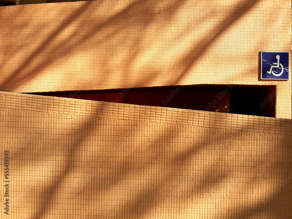 A wheelchair ramp, an inclined plane installed in addition to or ...