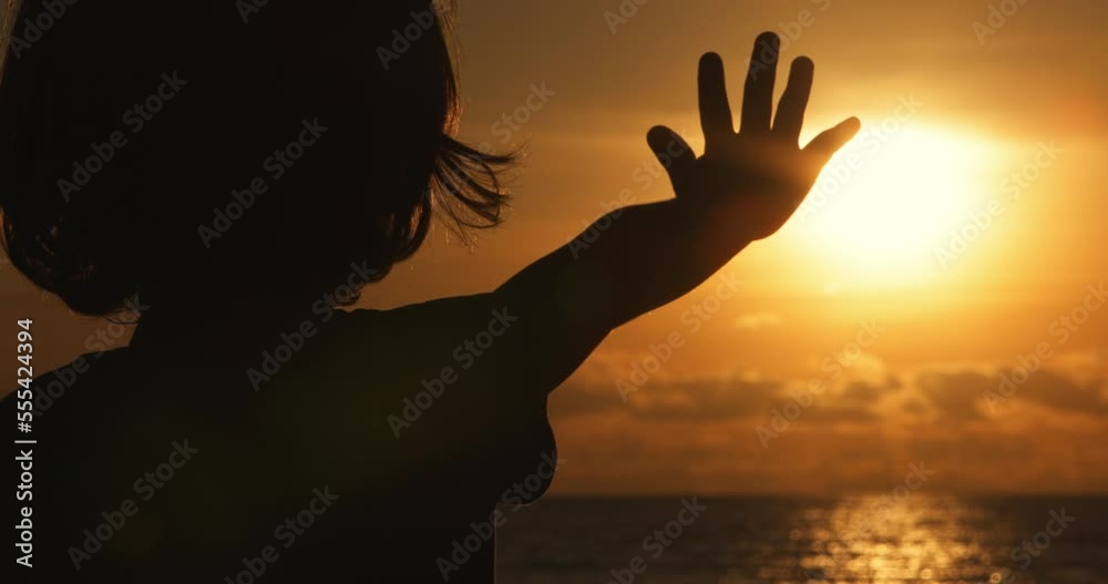 little boy kid catching sun glare with fingers hand, child silhouette ...