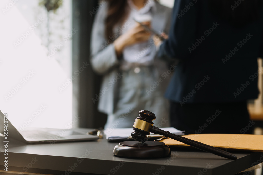 Male lawyer working with contract papers and wooden gavel on tabel in ...