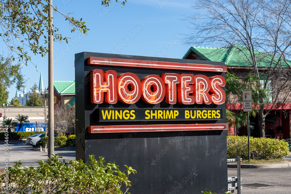 Orlando, FL, USA - January 6, 2022: A Hooters restaurant sign is shown ...