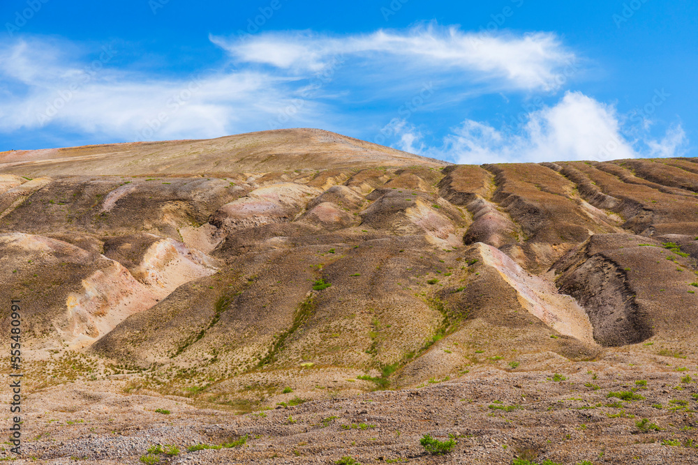 Small streams have carved wide channels in the ash and pumice covering ...