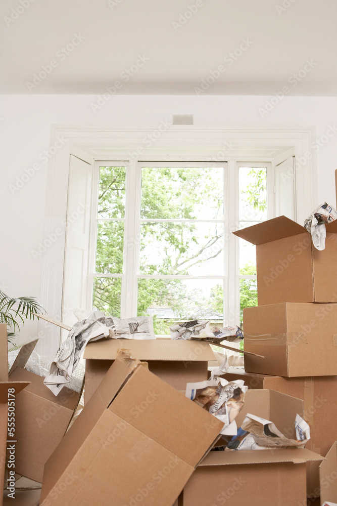 Pile of Boxes in Room Stock Photo | Adobe Stock