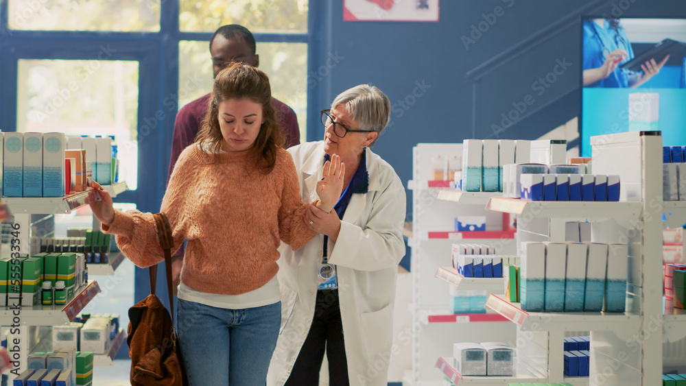 Young woman losing consciousness and almost fainting in pharmacy ...
