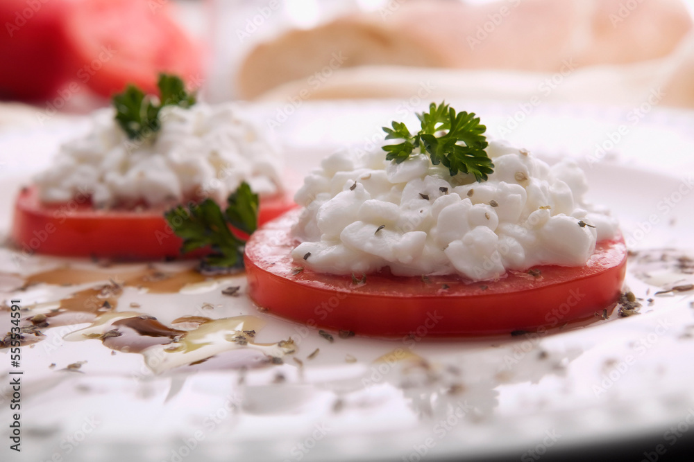 Cottage Cheese on Tomato Slices Stock Photo | Adobe Stock