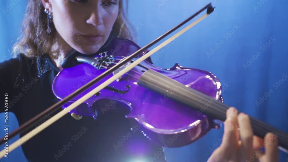 The female violinist plays the violin at the music school, the musician ...