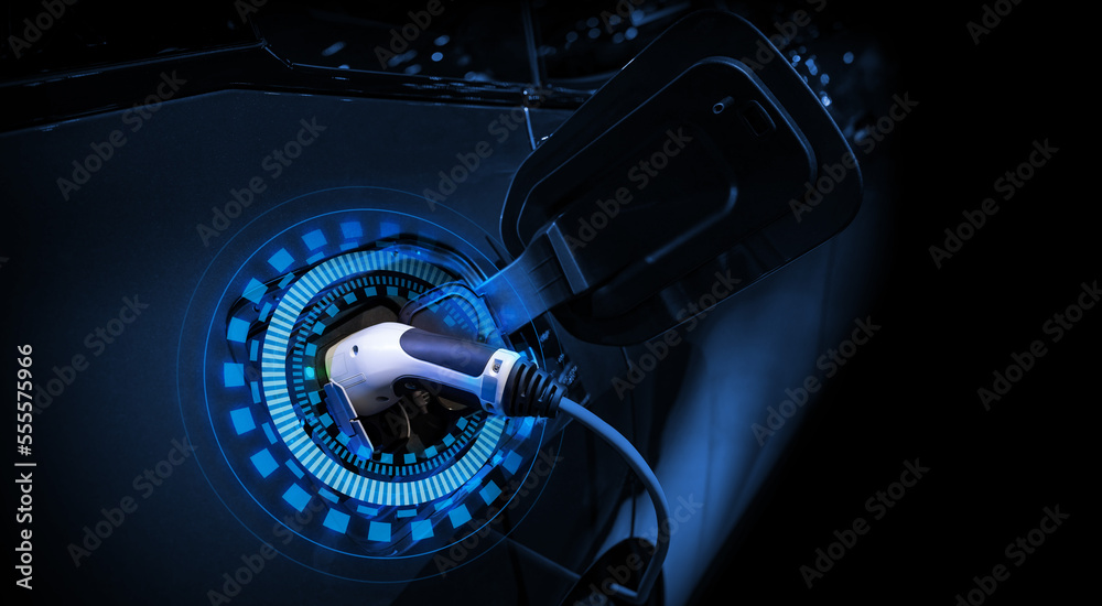 Photo Power cable pump plug in charging power to electric vehicle EV ...