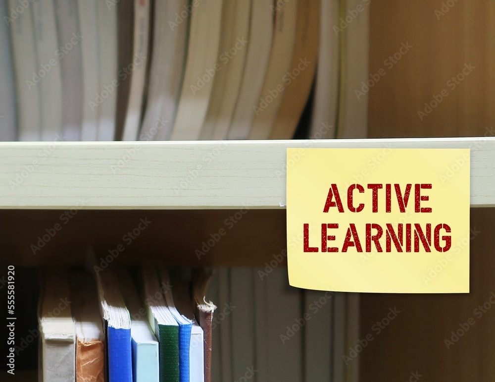 Text books on shelve with text written ACTIVE LEARNING, means learning ...