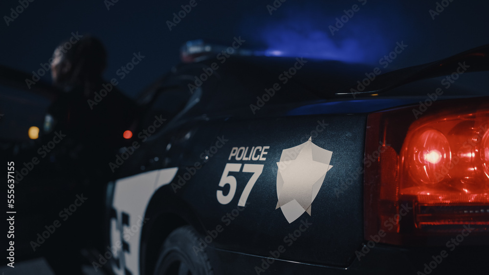 Camera Focus on Police Car Logo and Number. Female Officer Leaving the ...