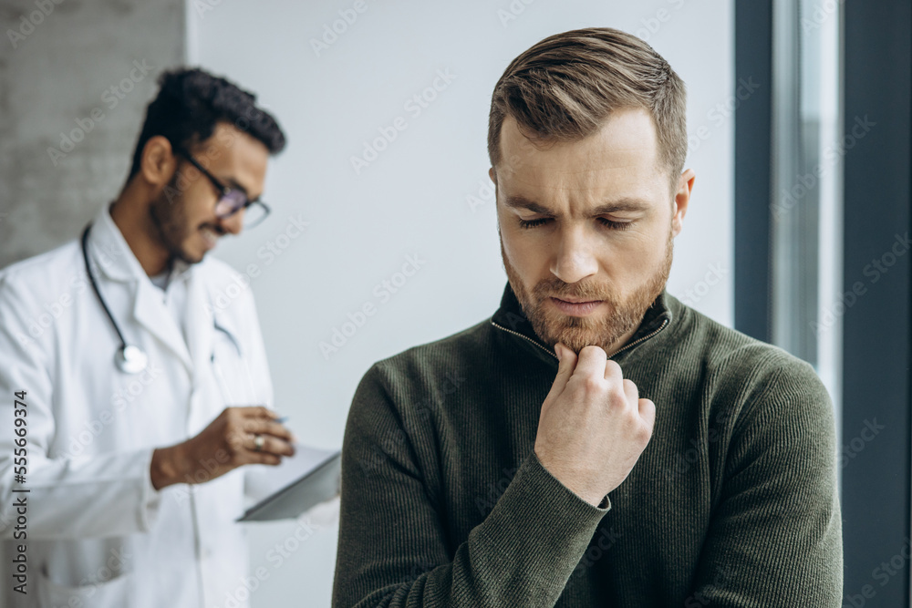 Patient having a visit at doctor making check-up Stock Photo | Adobe Stock