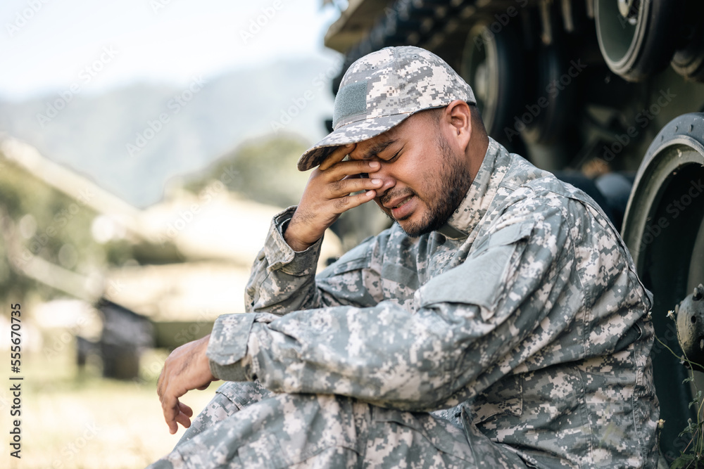 Stressed depressed crying lose war Asian man special forces soldier ...