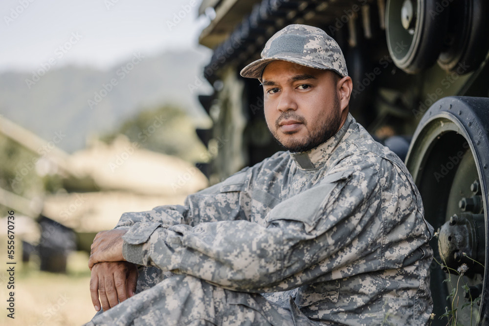 Asian man special forces soldier against on the field Mission ...