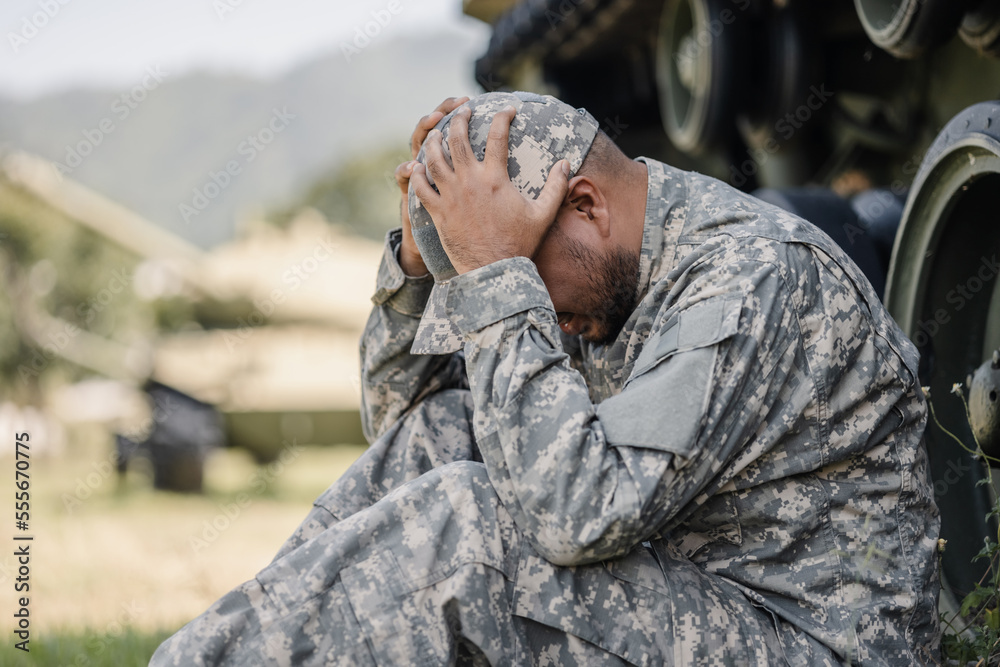 Stressed depressed crying lose war Asian man special forces soldier ...
