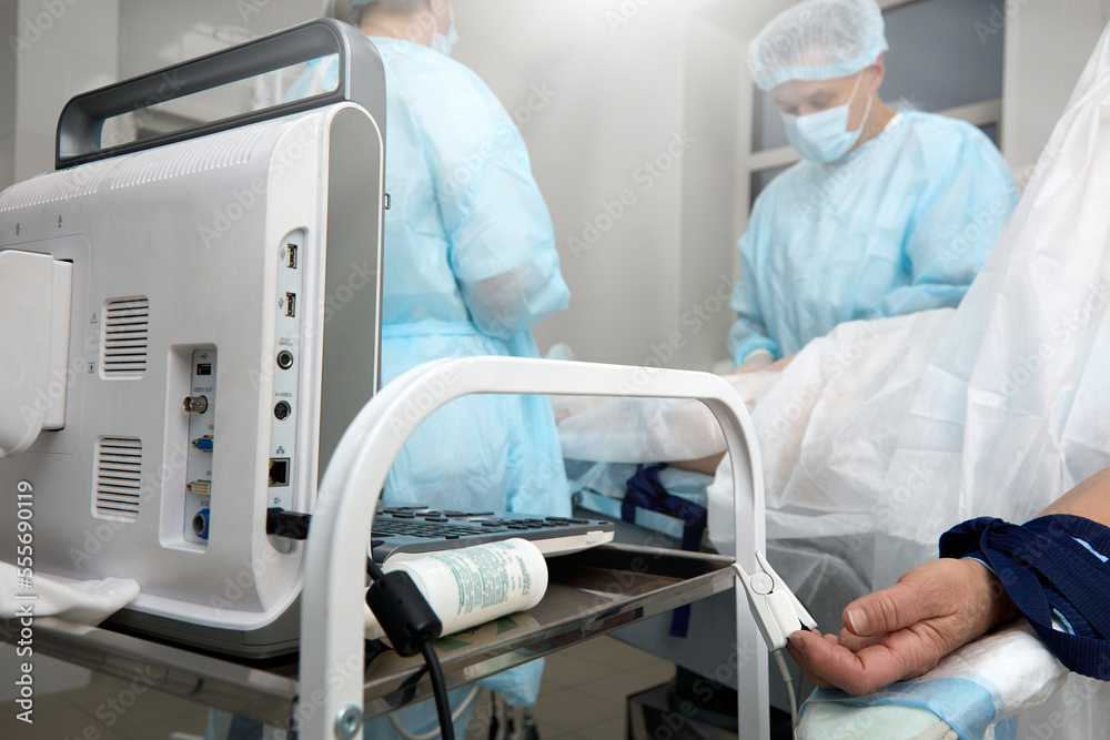 Operation process is carried out surgeon and assistant, patient's hand ...